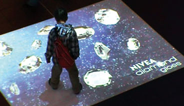 debut of living surface out-of-home advertising network with nivea